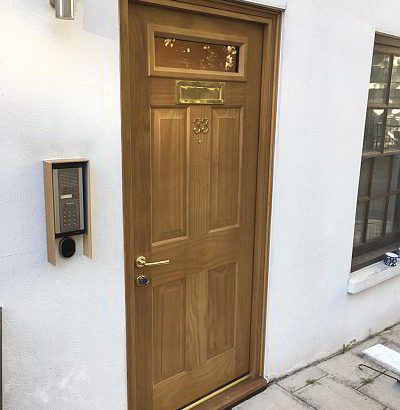 High security front door with glazed panel - Henleys Security Doors